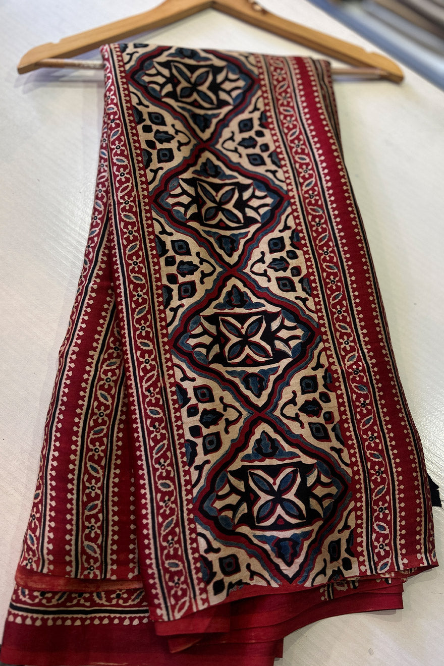 Pure modal silk saree- brick red and black– House of Mannath